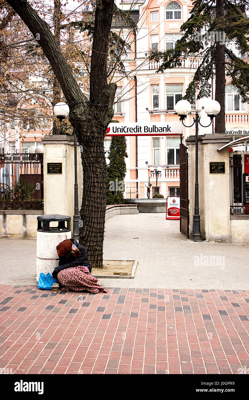 Poor people in Europe. Bulgaria, Varna 27.12.2016. Old Lady asks for ...