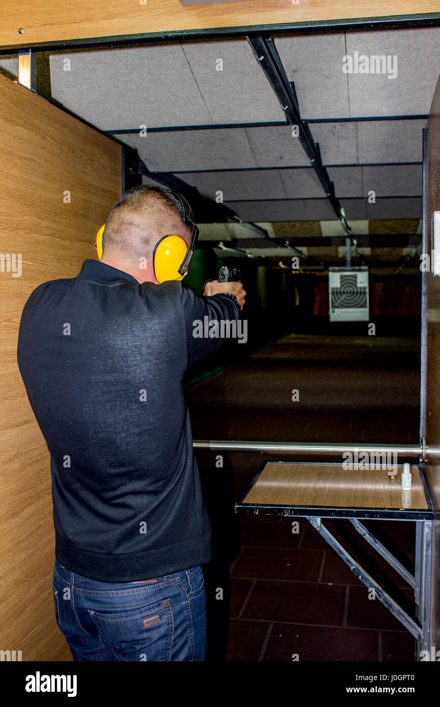 Aiming shooting firearm revolver hi-res stock photography and images ...