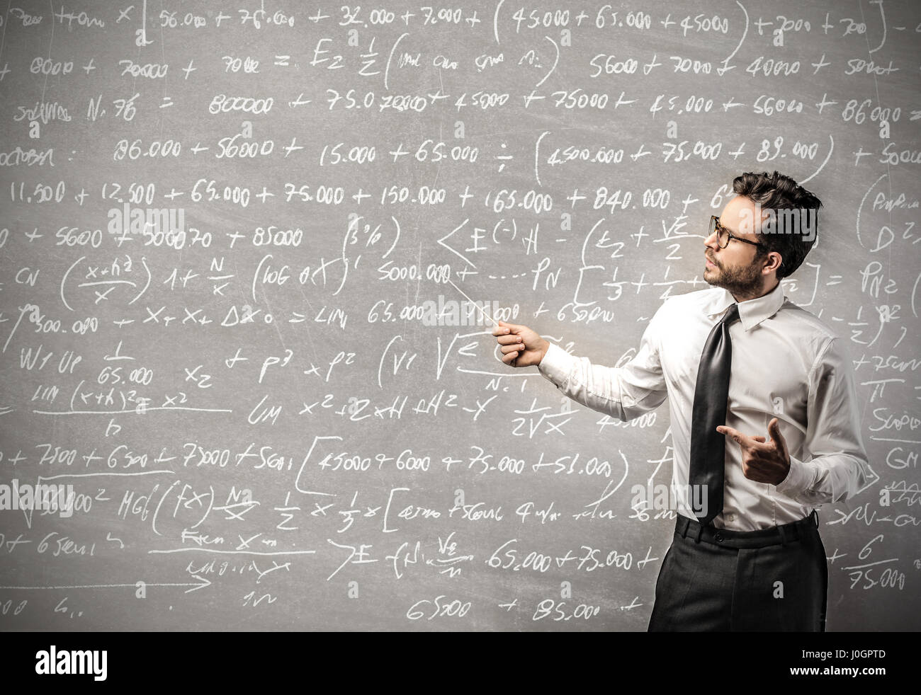 Businessman teaching math Stock Photo - Alamy
