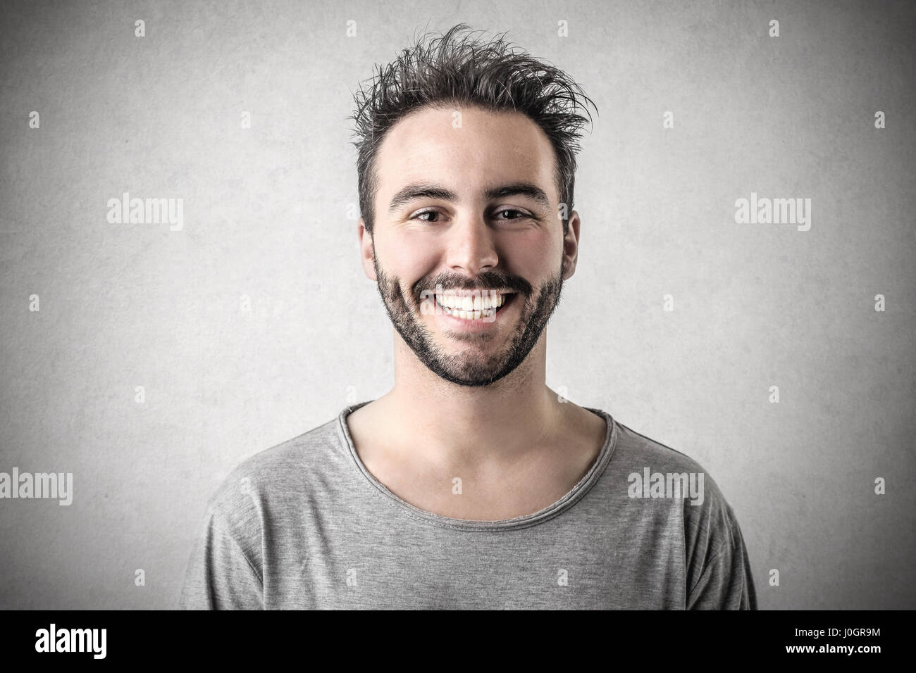 Smiling man's portrait Stock Photo - Alamy