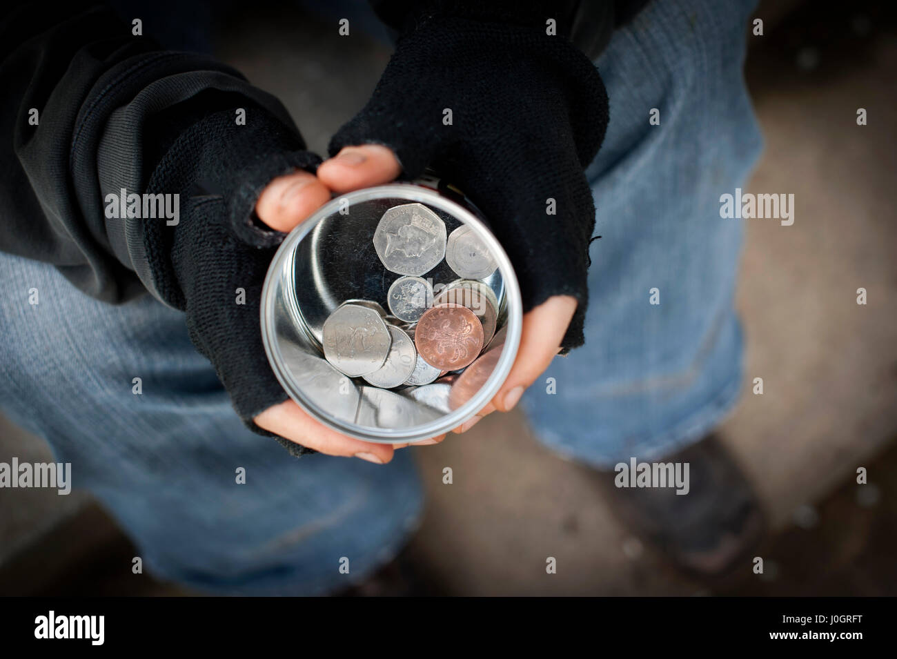Begging on the streets hi-res stock photography and images - Alamy