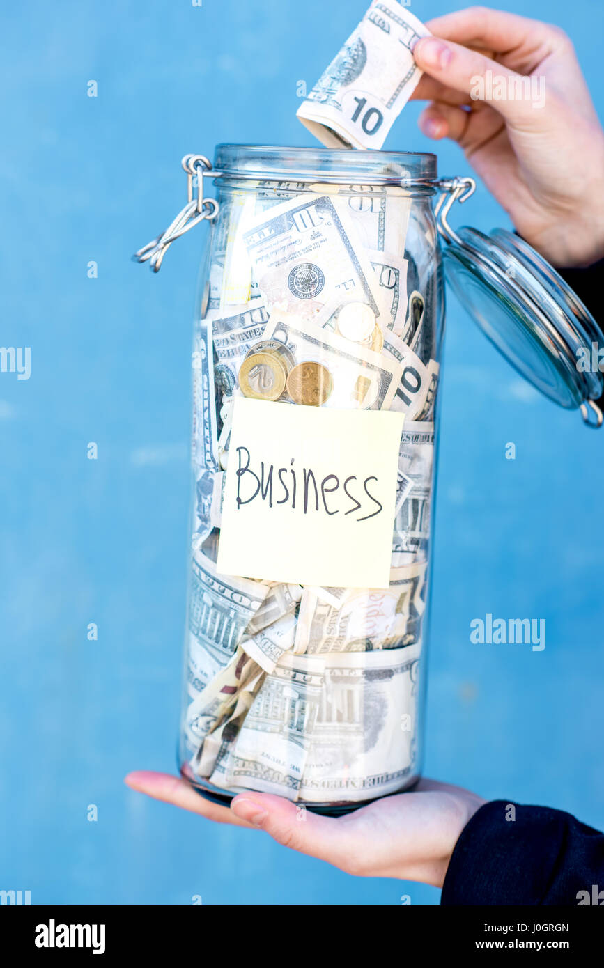 Close up hands putting coins hi-res stock photography and images - Alamy
