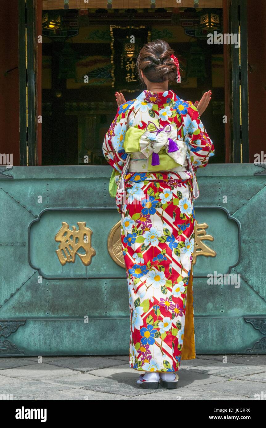 Young Japanese woman wearing a traditional dress called Kimono at Senso ...