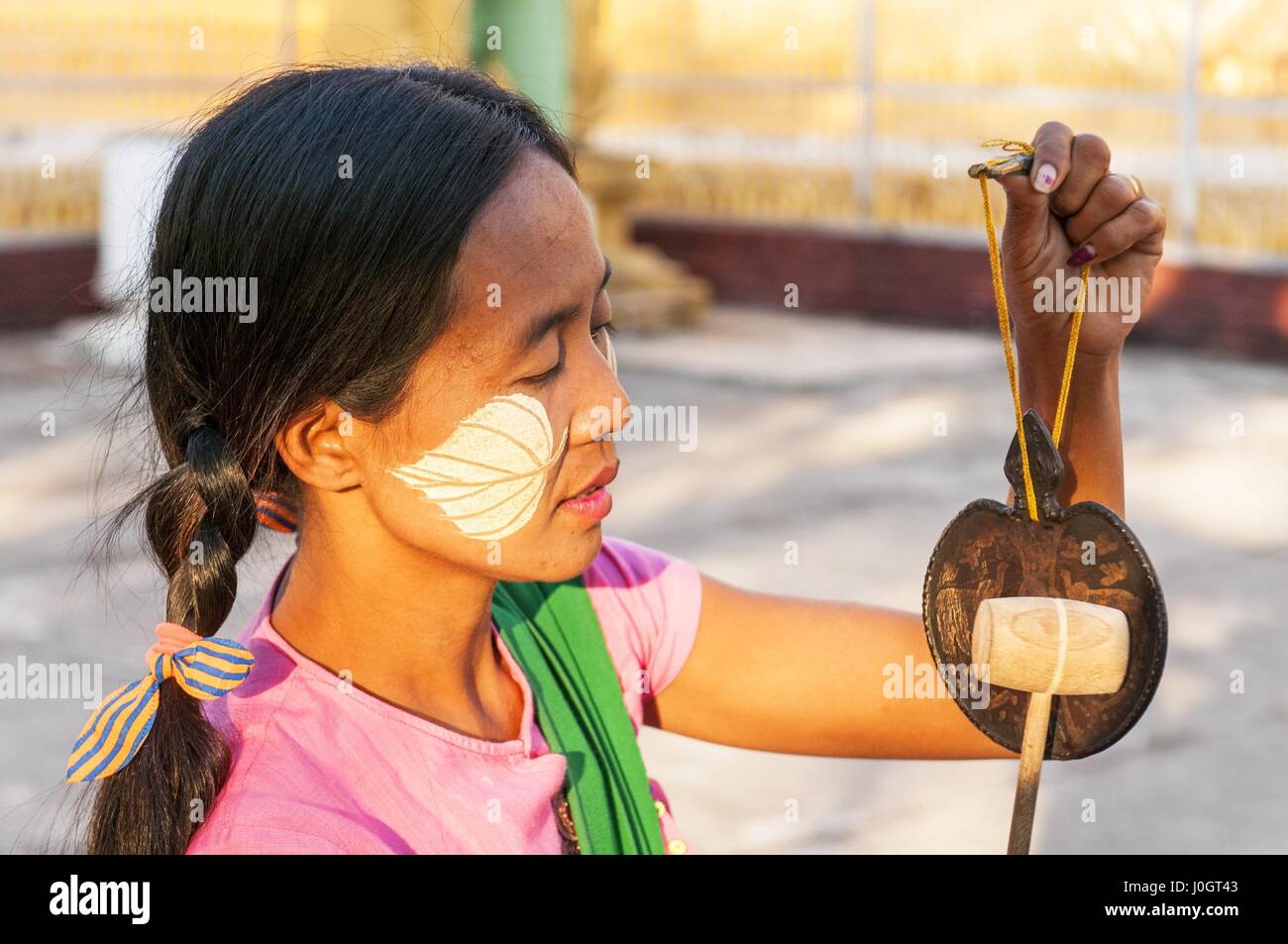 Myanmar woman with thanaka on her smiley face Mandalay, Myanmar ...