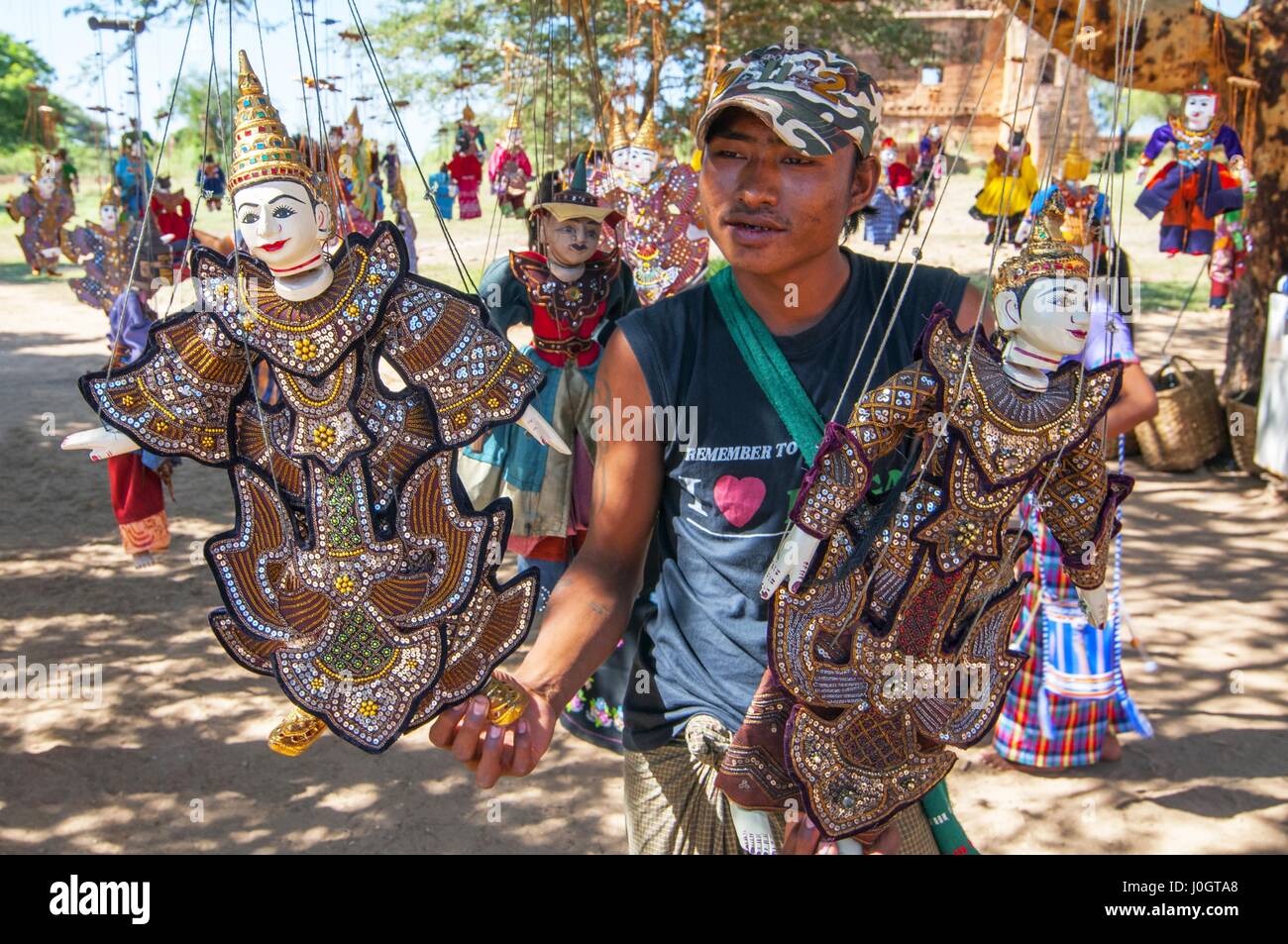 Traditional handicraft puppets are sold in a market at Bagan Myanmar ...