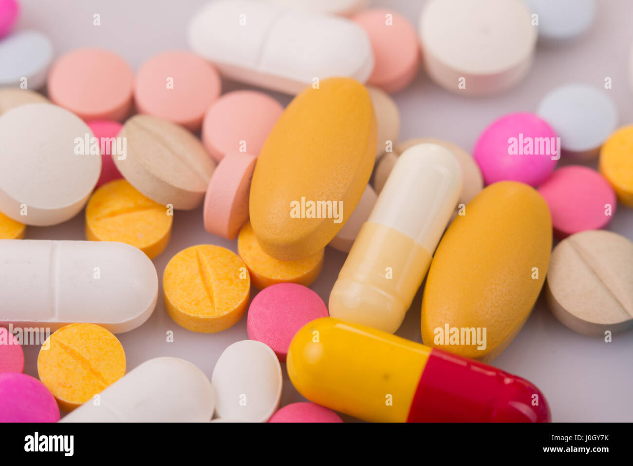 different Tablets pills capsule heap mix therapy drugs Stock Photo - Alamy