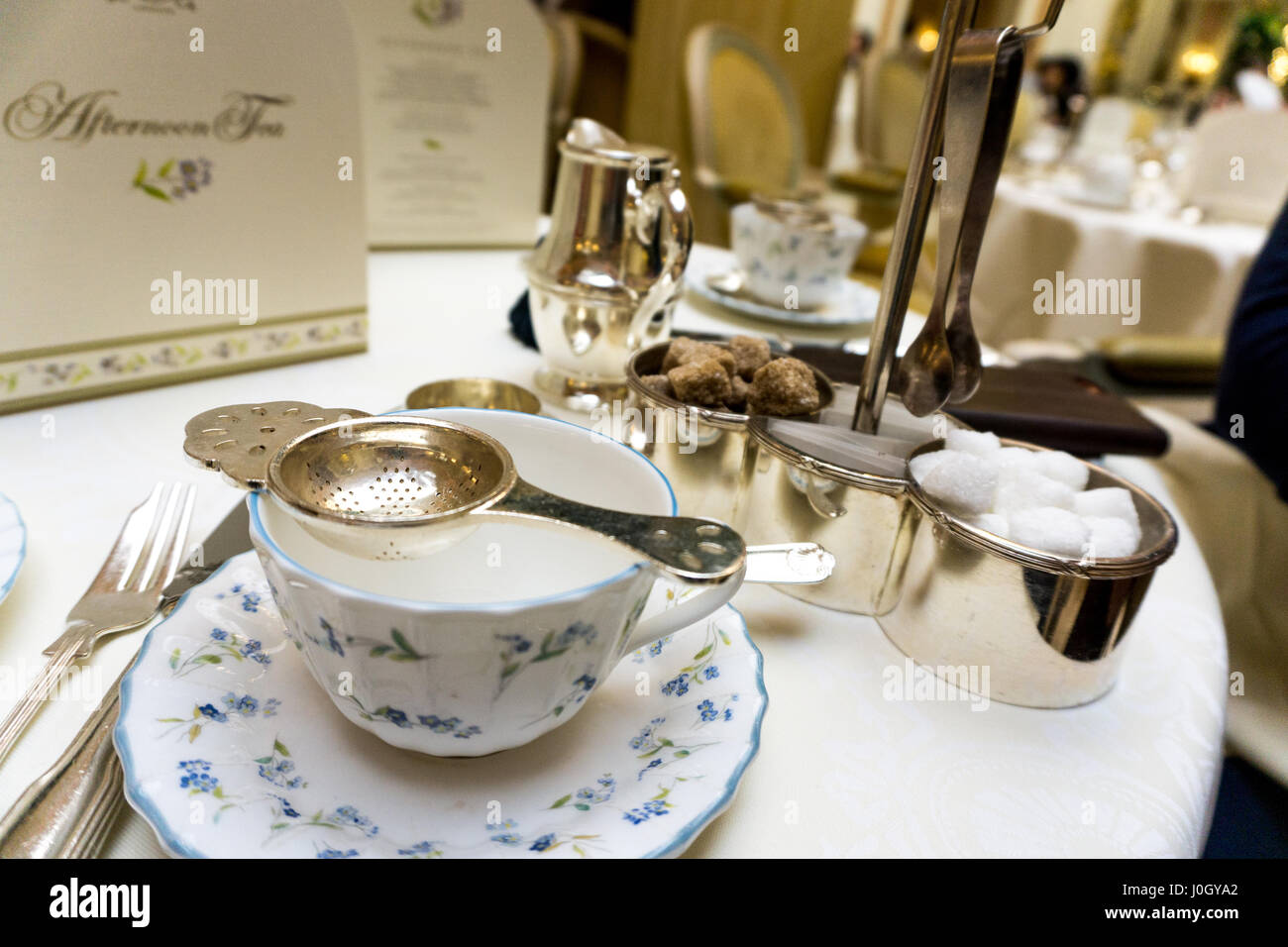Interior of the Ritz Hotel in London, England, with teacups, tea ...