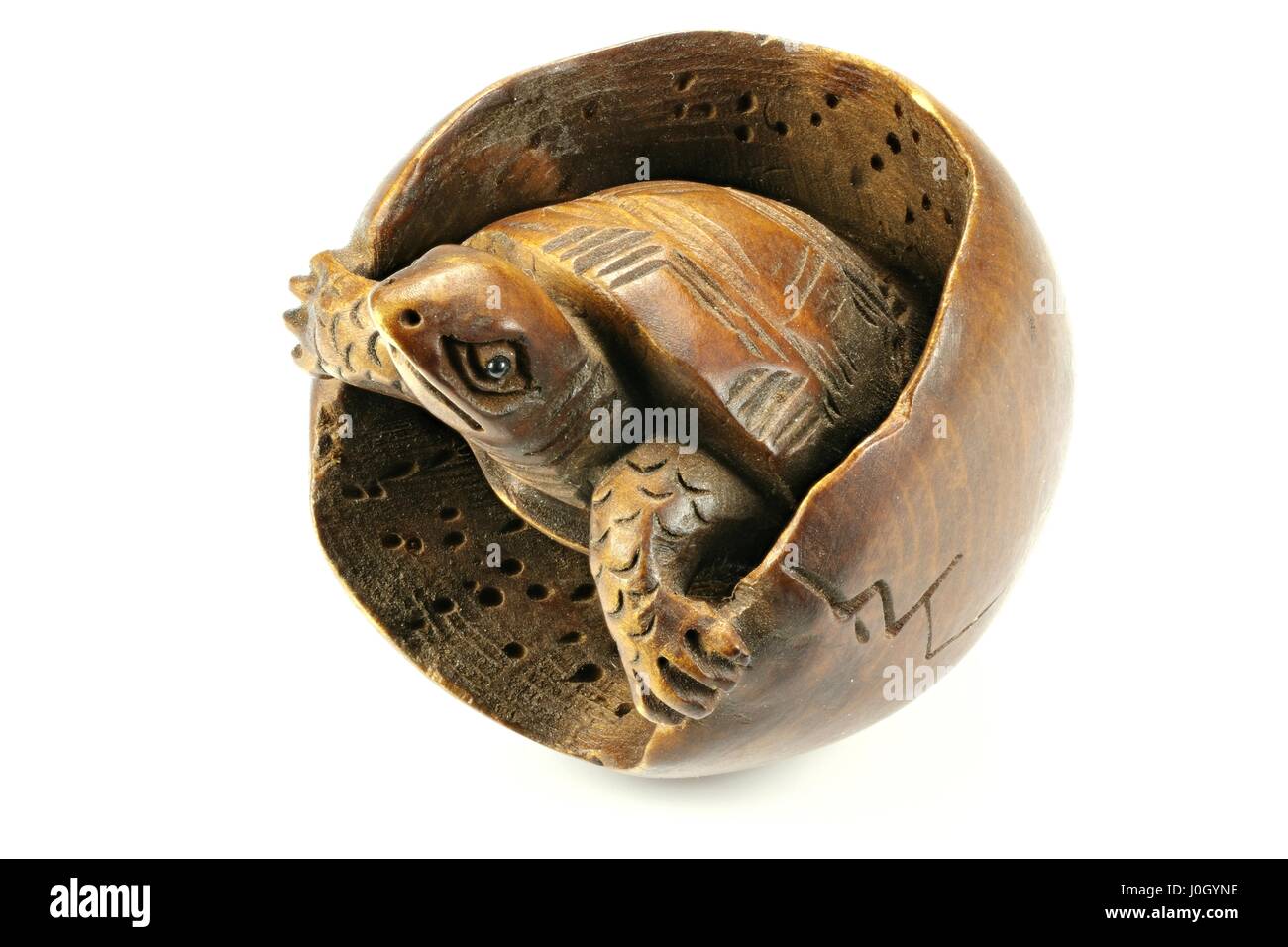 antique Japanese netsuke turtle made of boxwood isolated on white ...