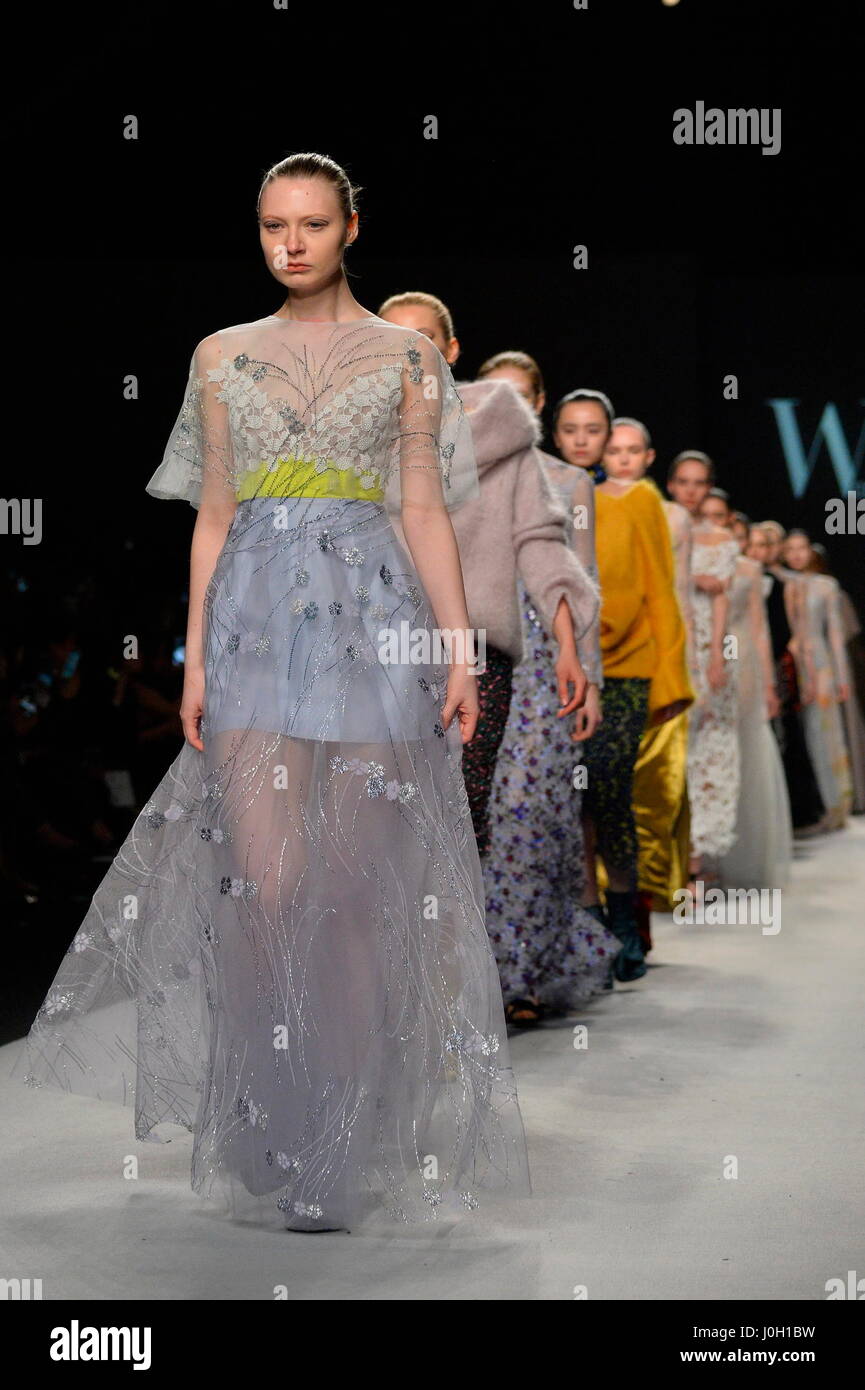 Shanghai, China. 12th Apr, 2017. Models present creations of the brand ...