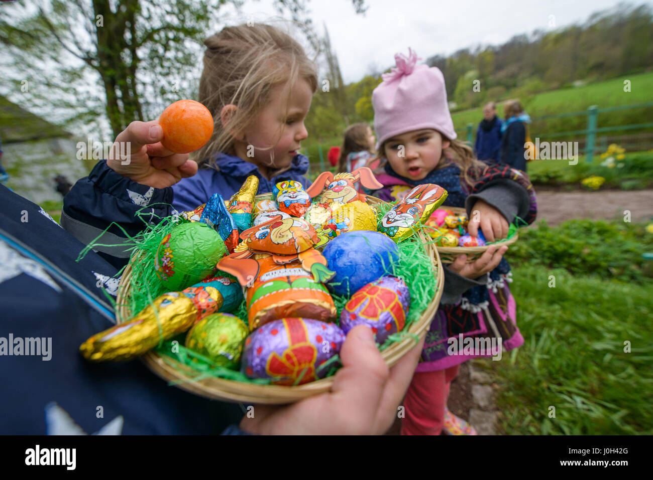 Weimar, Germany. 13th Apr, 2017. A Nursery child holds up an Easter egg ...