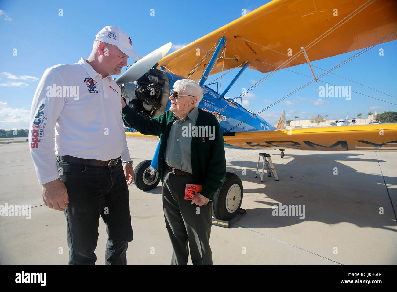 Florida, USA. 13th Apr, 2017. Duane Webster, age 95, talks with Darryl ...