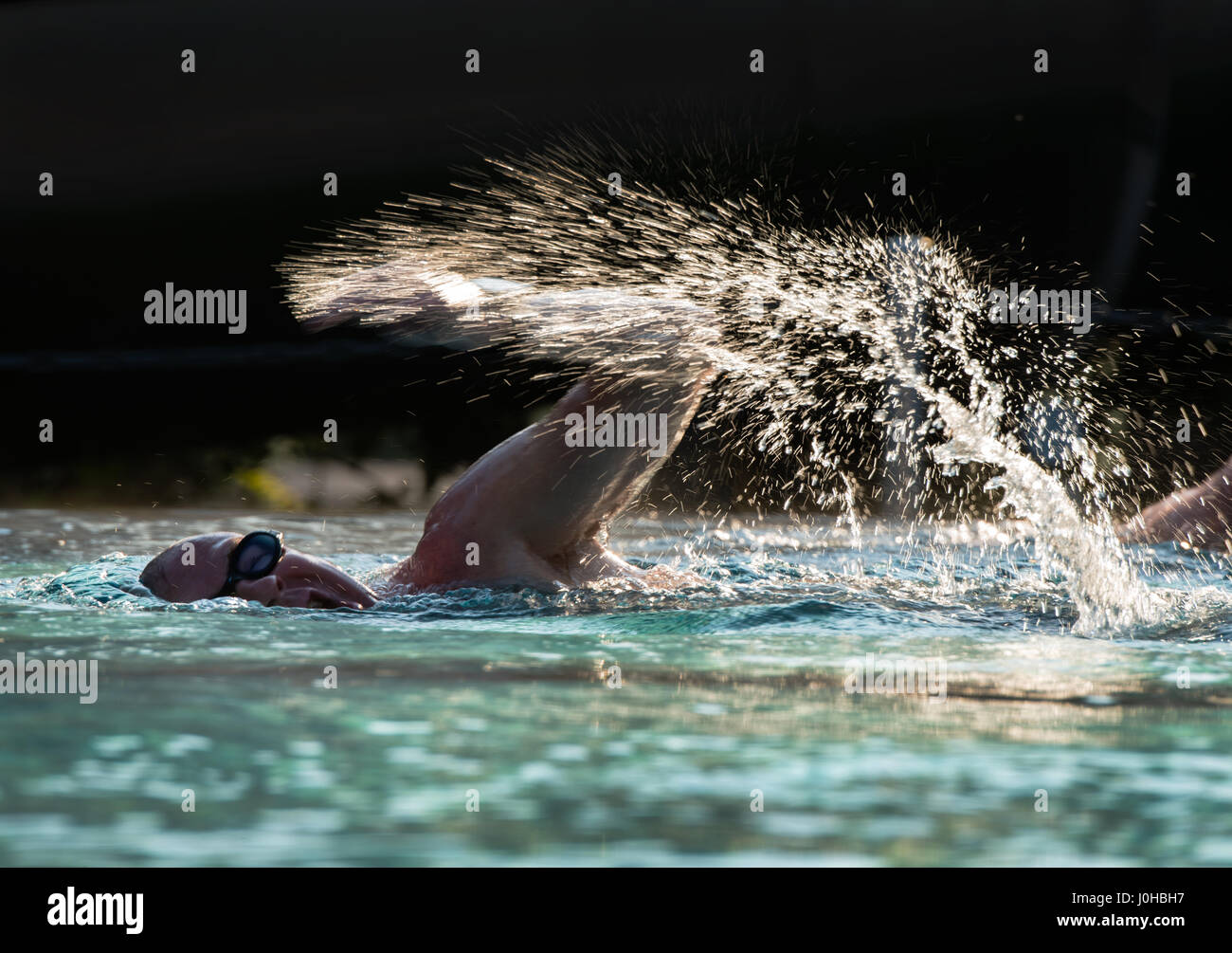 Wiesbaden, Germany. 14th Apr, 2017. A man swims the crawl in a pool in ...