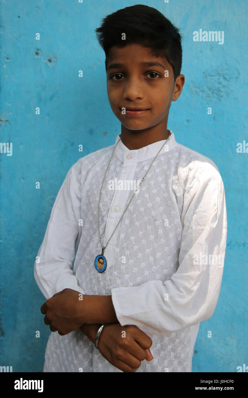 Mumbai, India. 14th Apr, 2017. A boy poses for a picture with state of ...