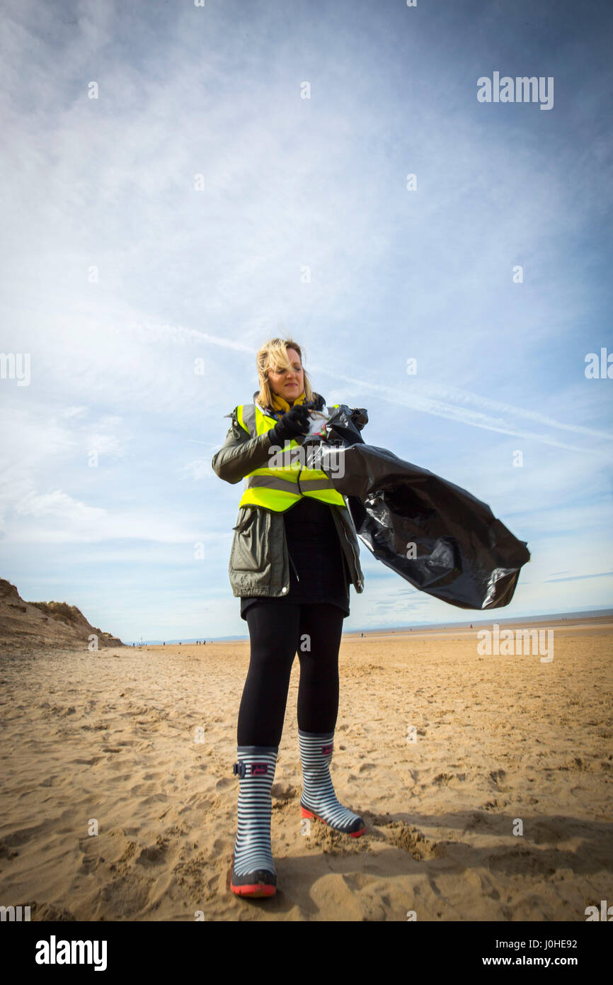 Litter picking beach formby hi-res stock photography and images - Alamy