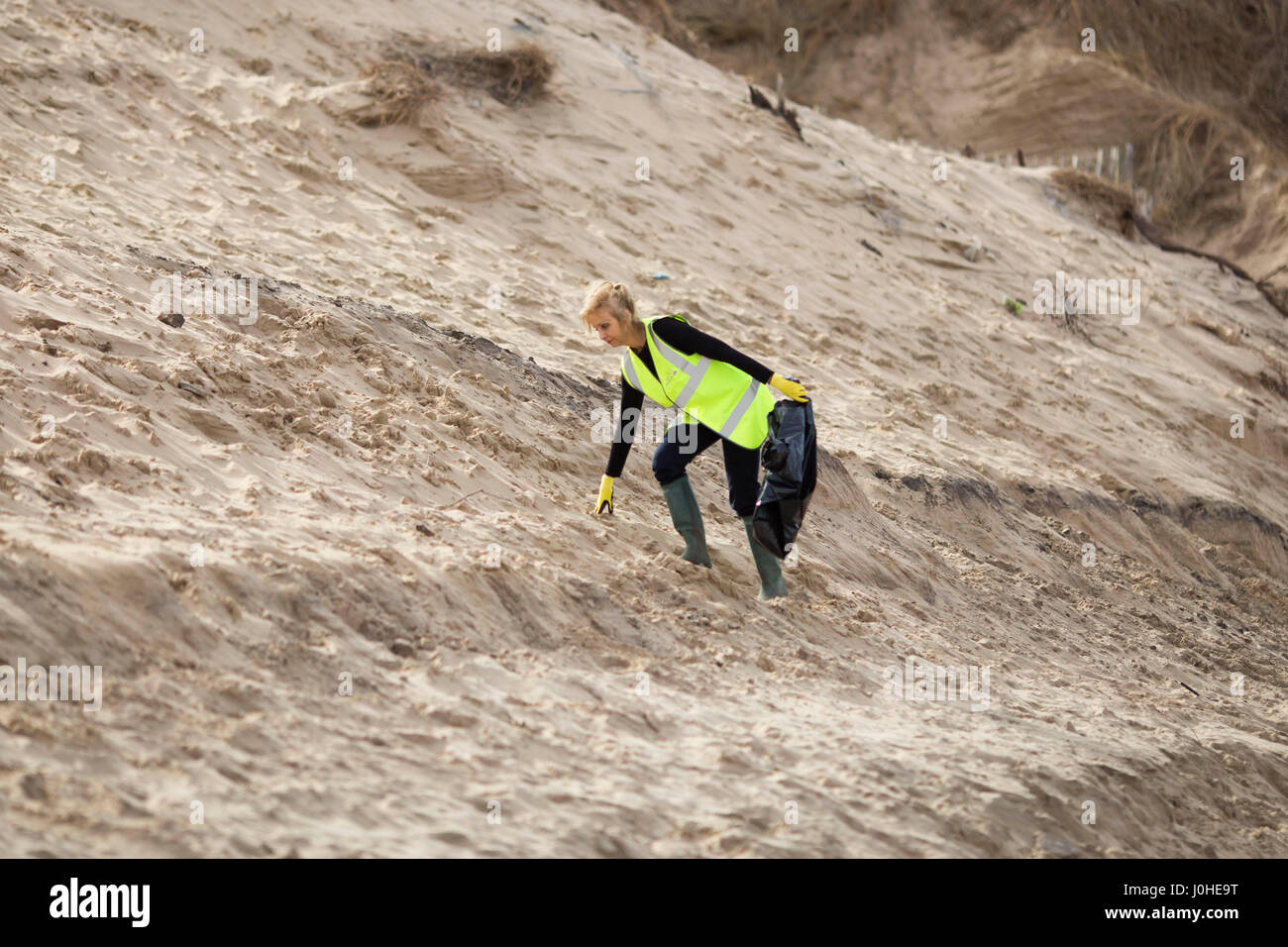 Litter picking beach formby hi-res stock photography and images - Alamy