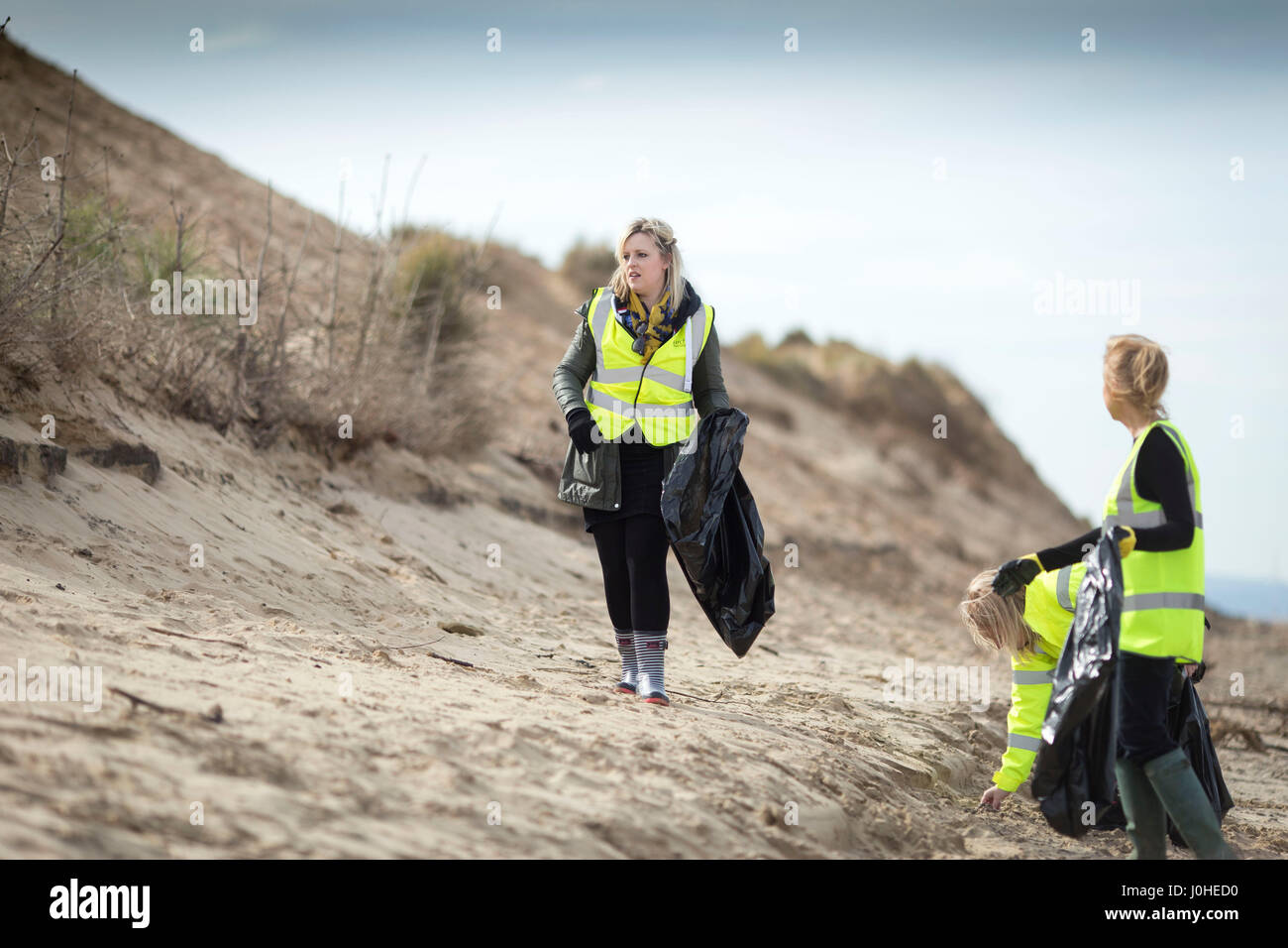 Litter pick on Formby beach UK Stock Photo - Alamy