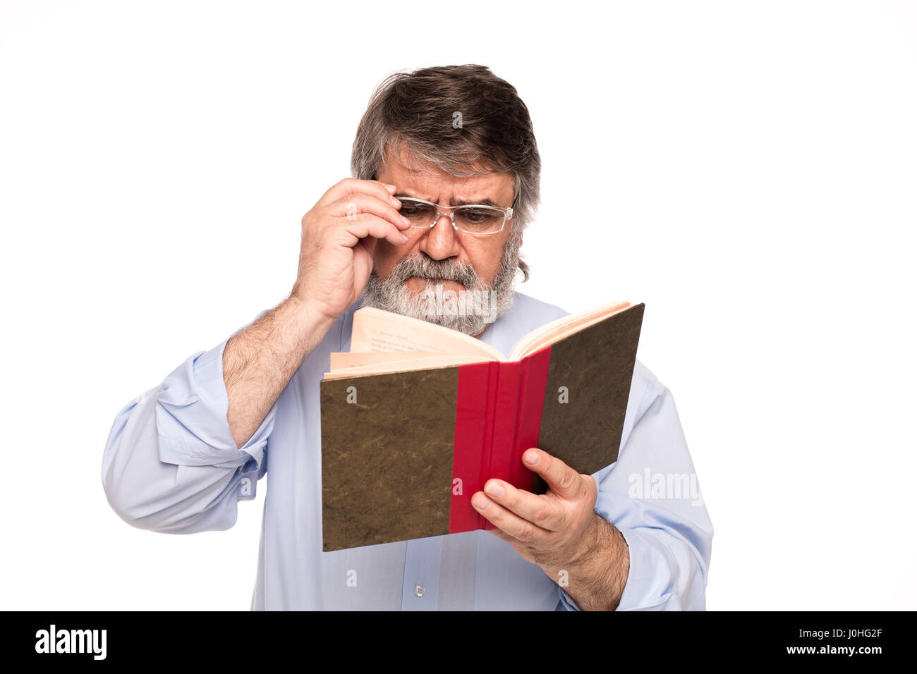 old men with glasses and gray beard reading a book, isolated on white ...