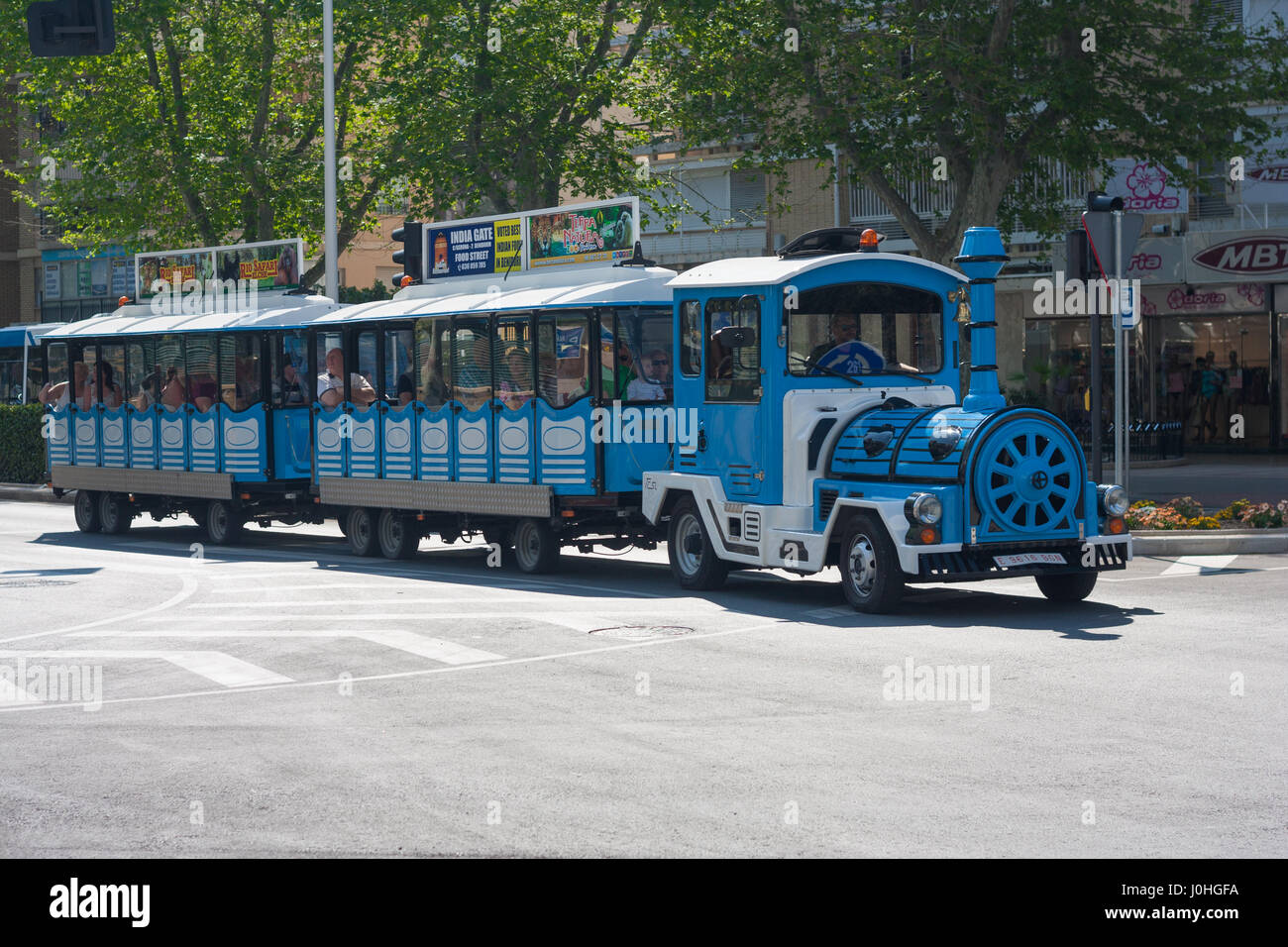 benidorm tourist road train Stock Photo - Alamy