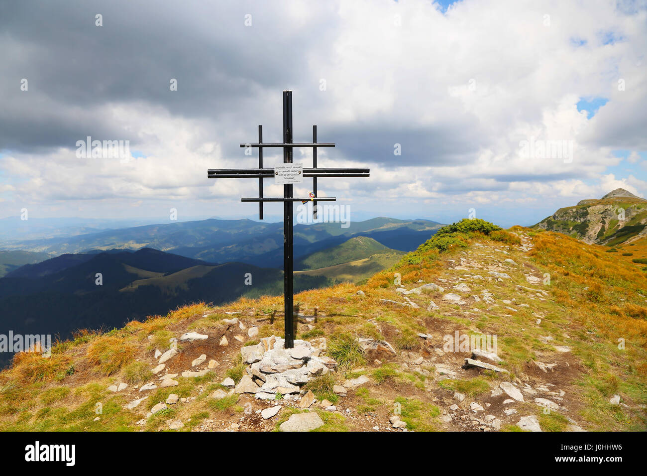 Mountain peak cross in Calimani Mountains, Vf.Negoiu Unguresc, Romania ...