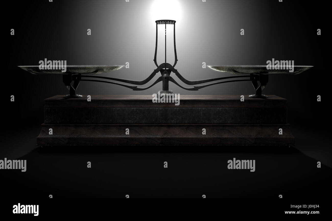 A closeup of empty old metal and wood two pan balance scale on a ...