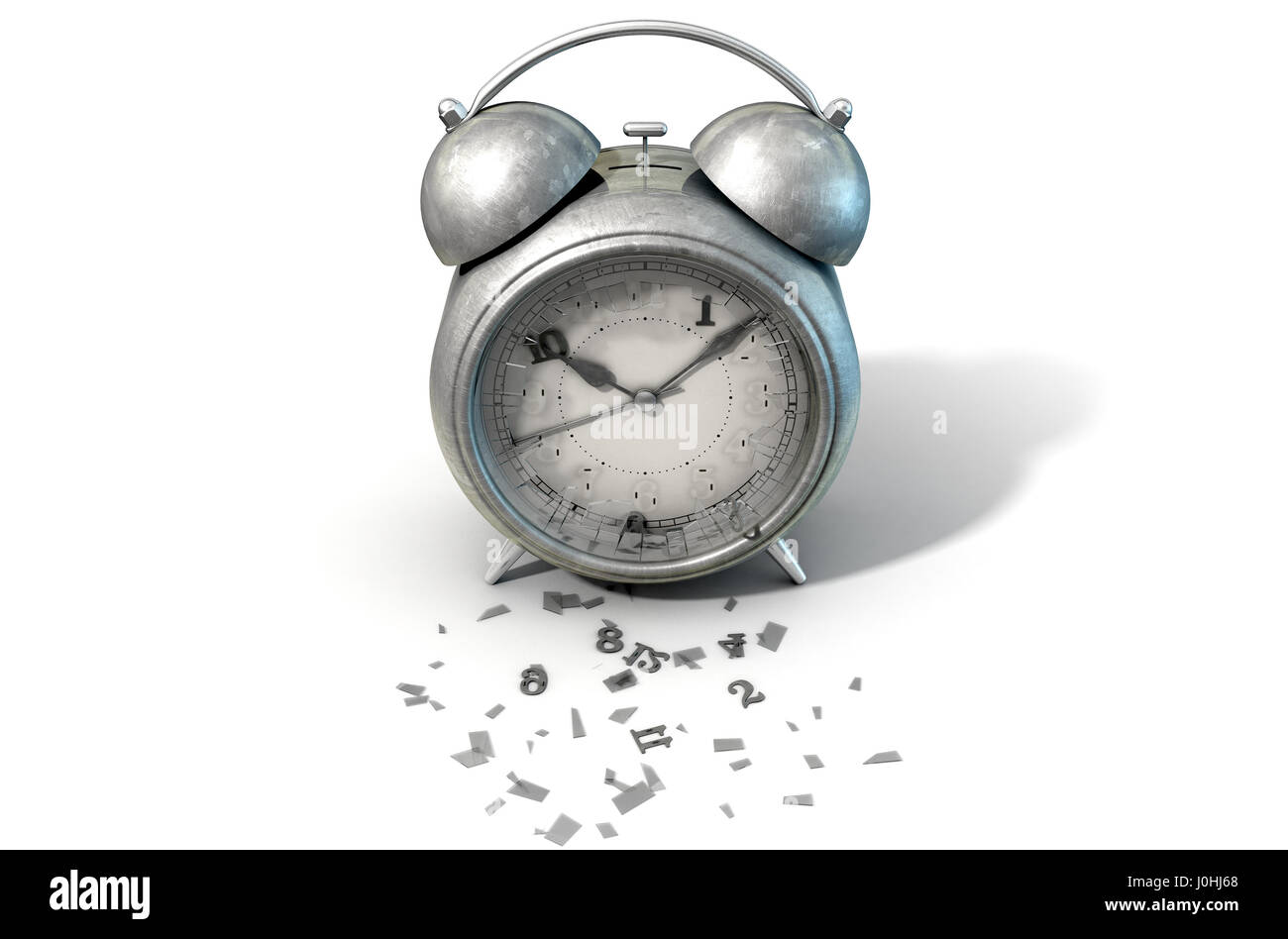 An old worn metal vintage desk clock with a smashed screen and numbers ...