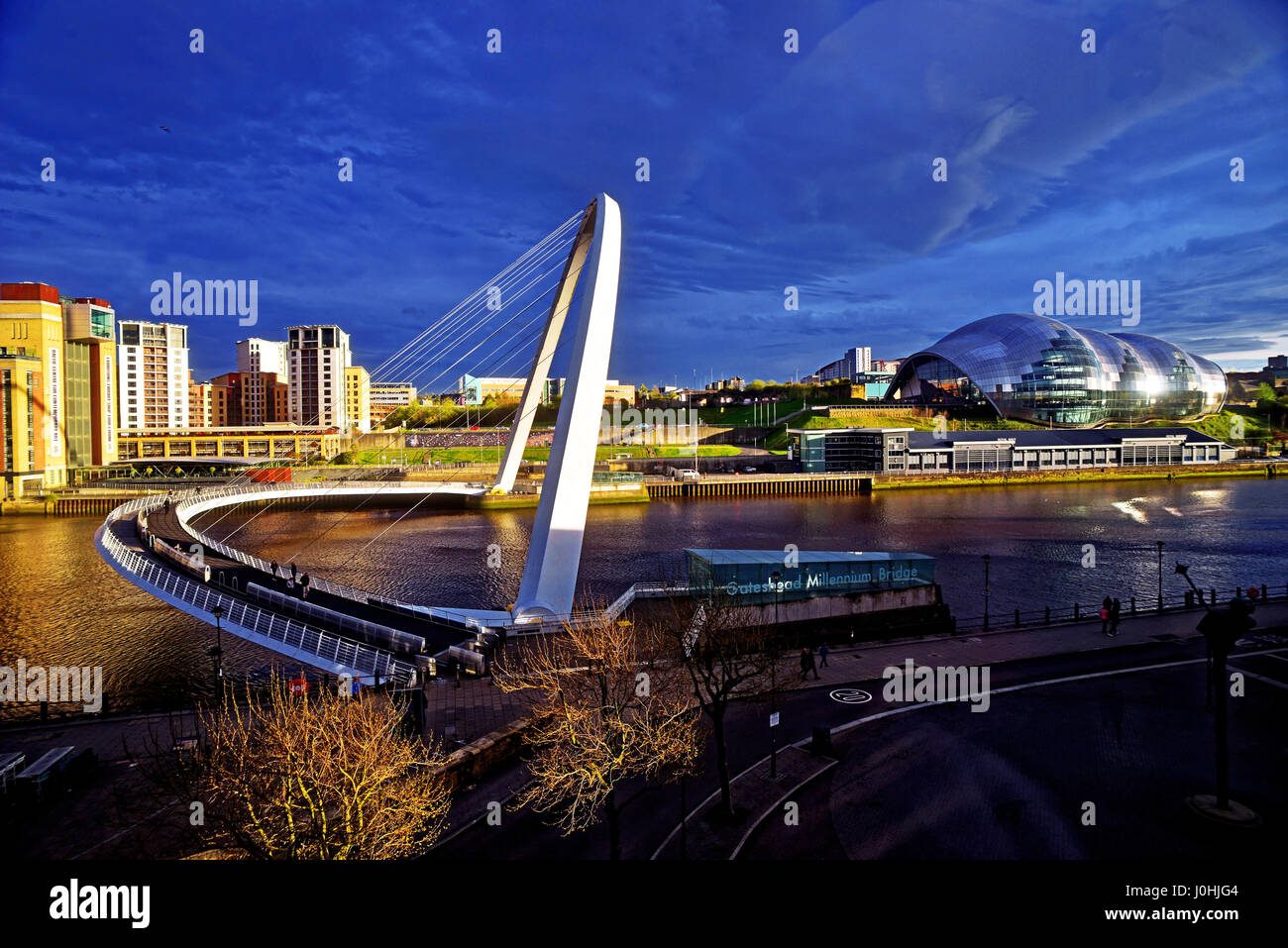 Gateshead Millennium Bridge over the River Tyne view of the Baltic Arts ...