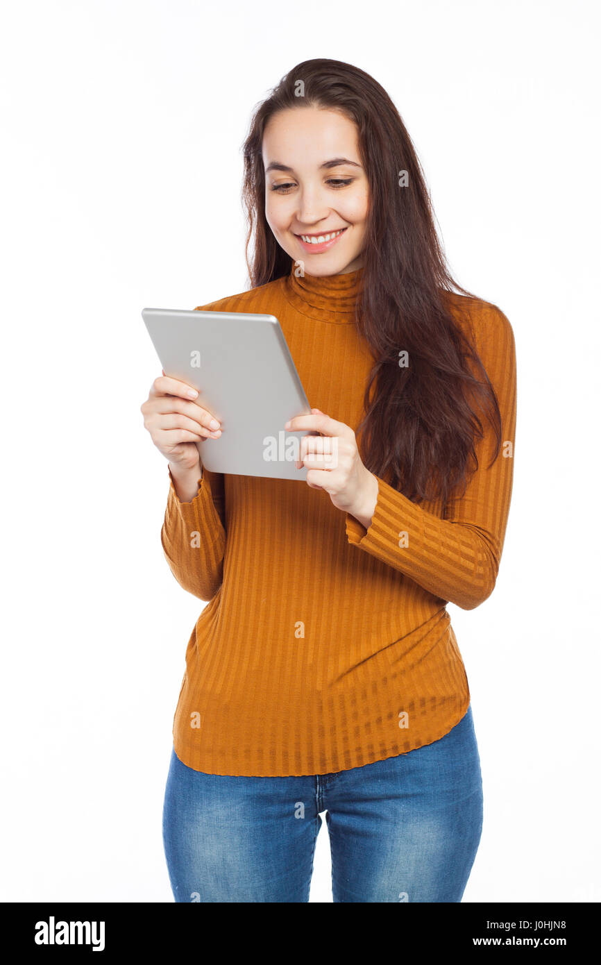 Young woman reading on an electronic tablet, isolated on white Stock ...
