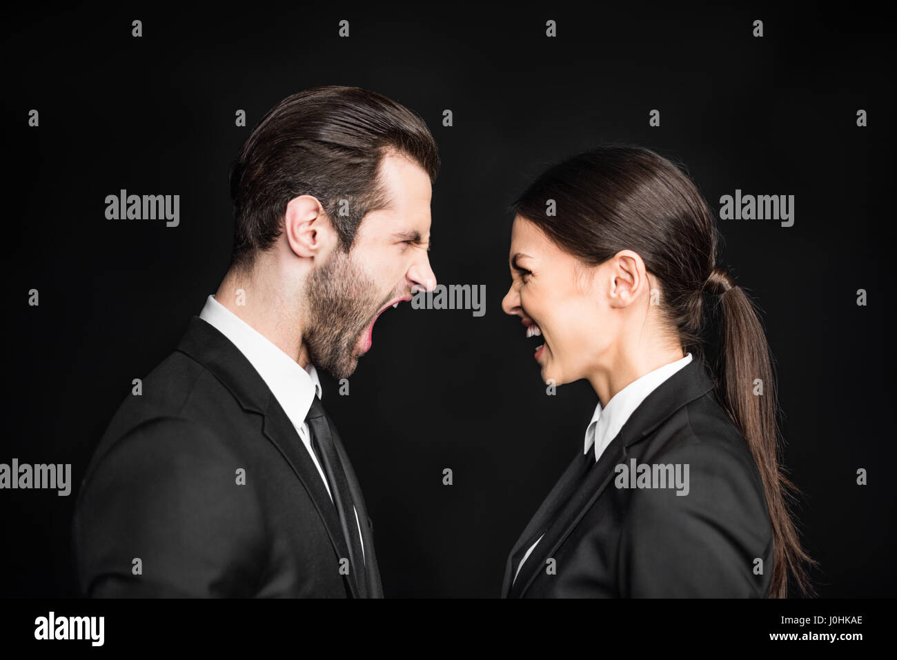 Two people screaming at each other hi-res stock photography and images ...