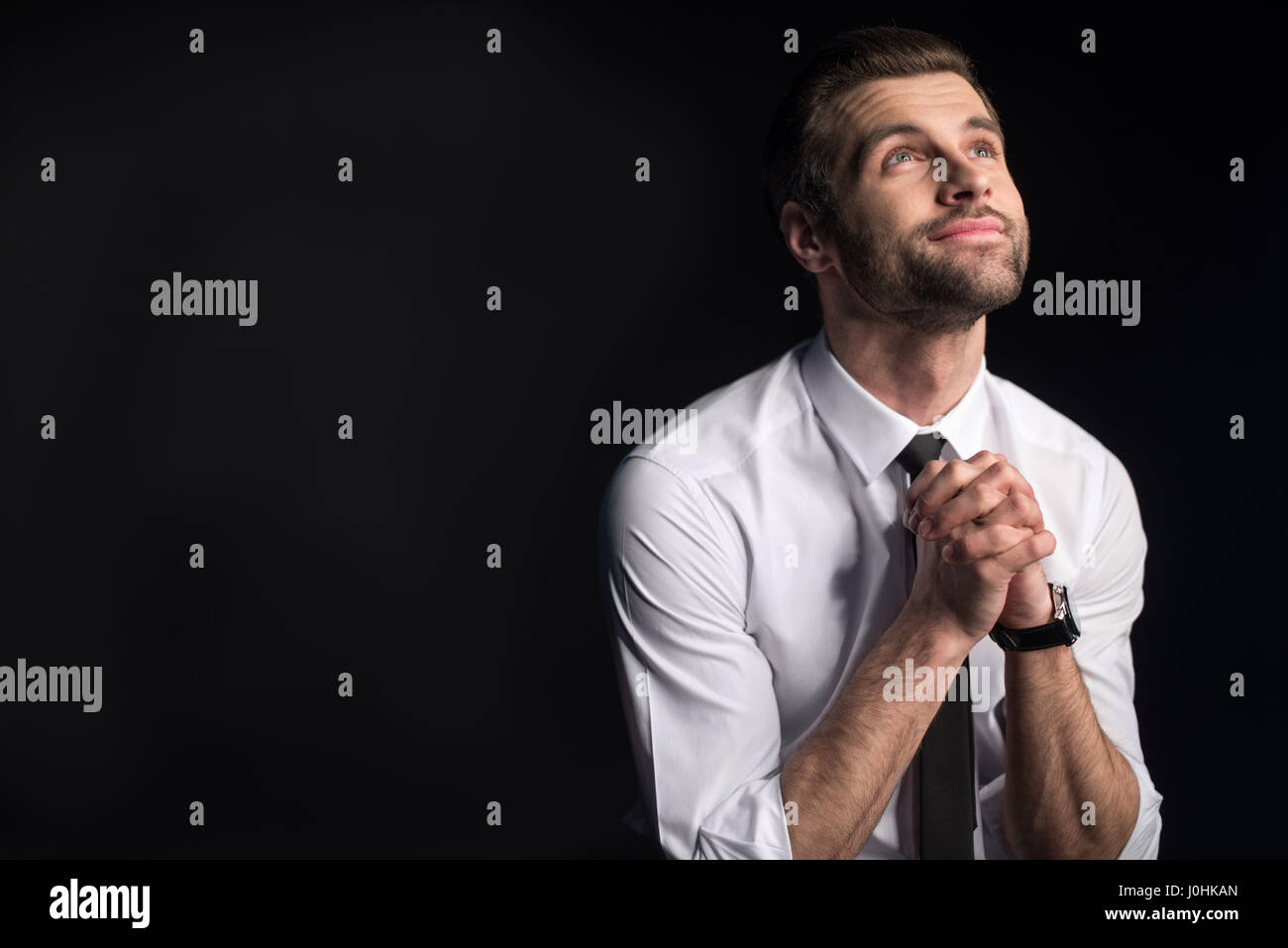 Handsome adult businessman praying hi-res stock photography and images ...
