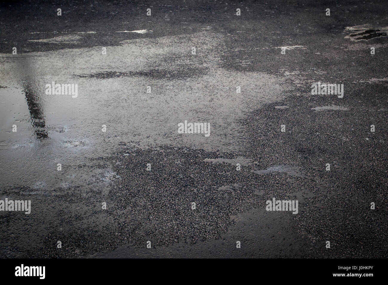 Wet road from asphalt Stock Photo - Alamy