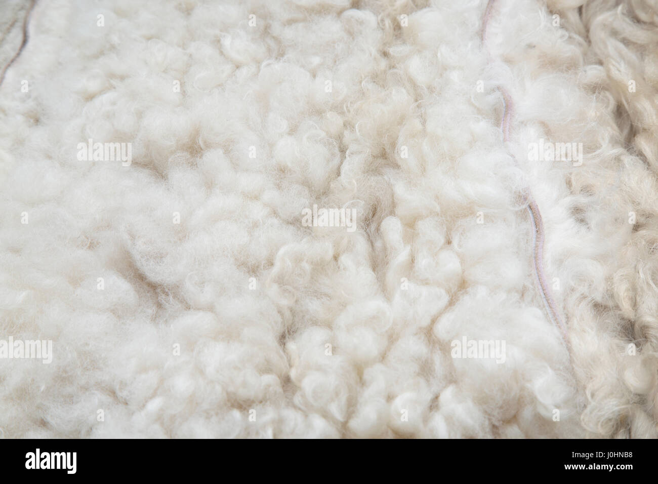 A full page of fluffy white material background texture Stock Photo - Alamy