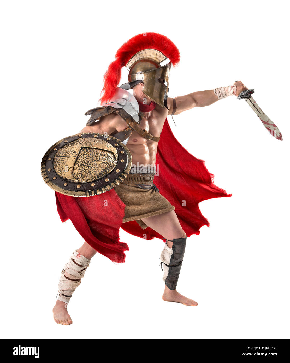 Ancient warrior or Gladiator posing over a white background Stock Photo ...