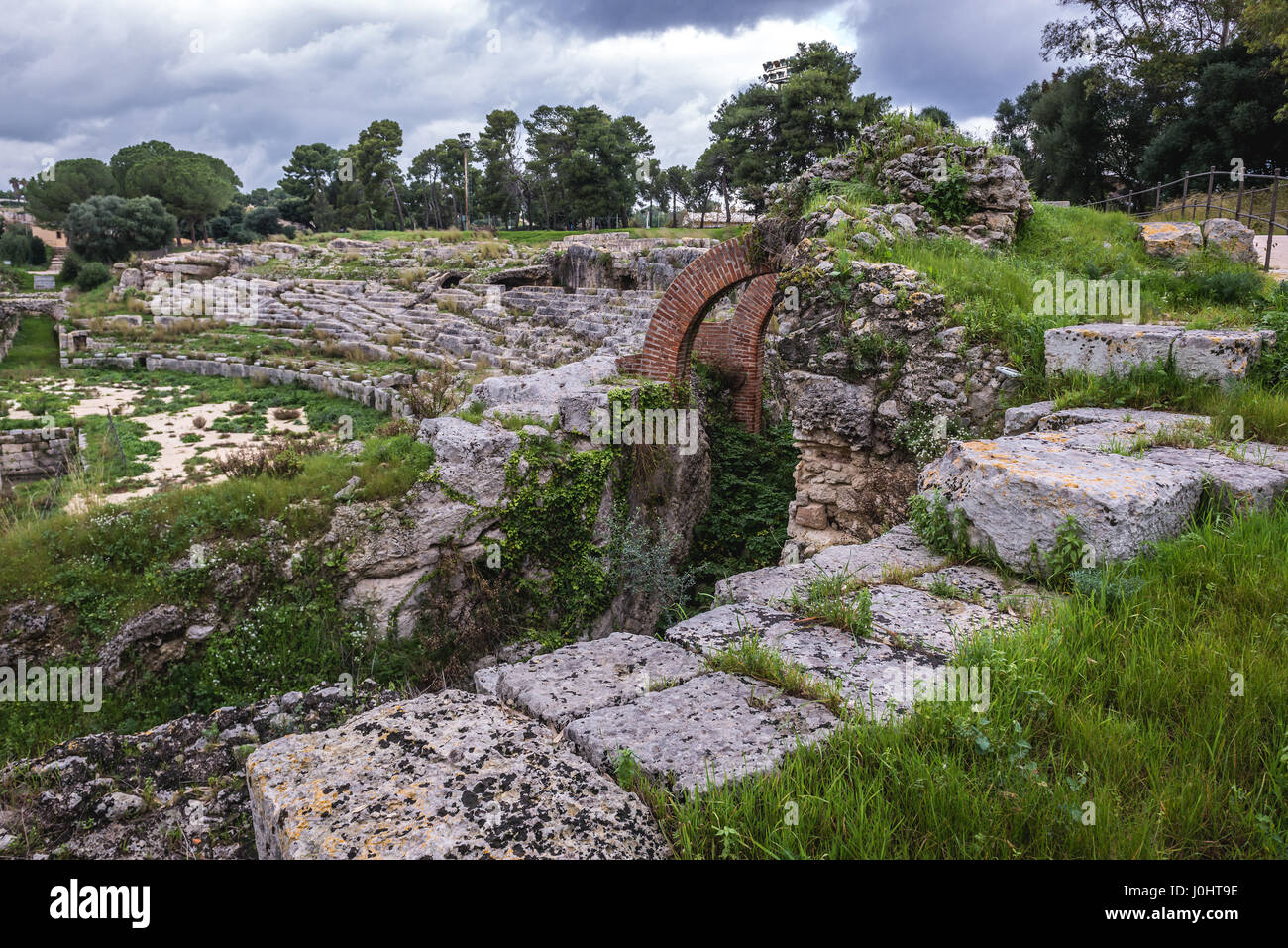 Renovated arches of Roman Amphitheater located in Neapolis ...