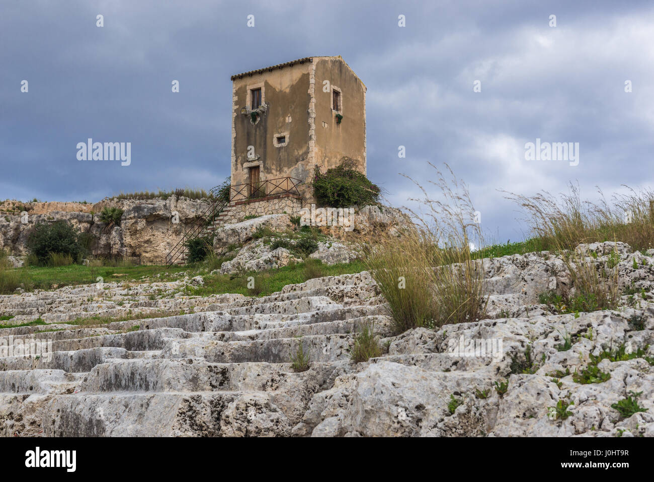 Small building above ancient ruins of Greek Theater from 5th century BC ...