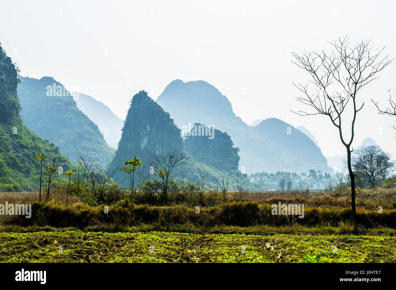 Karst mountains and rural scenery in winter, Guilin, China Stock Photo ...