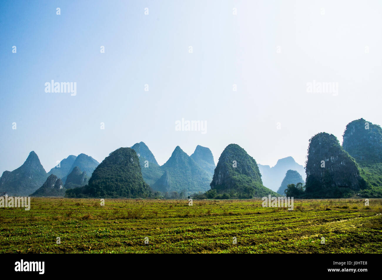 Karst mountains and rural scenery in winter, Guilin, China Stock Photo ...