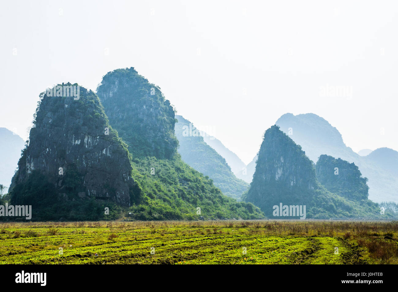 Karst mountains and rural scenery in winter, Guilin, China Stock Photo ...