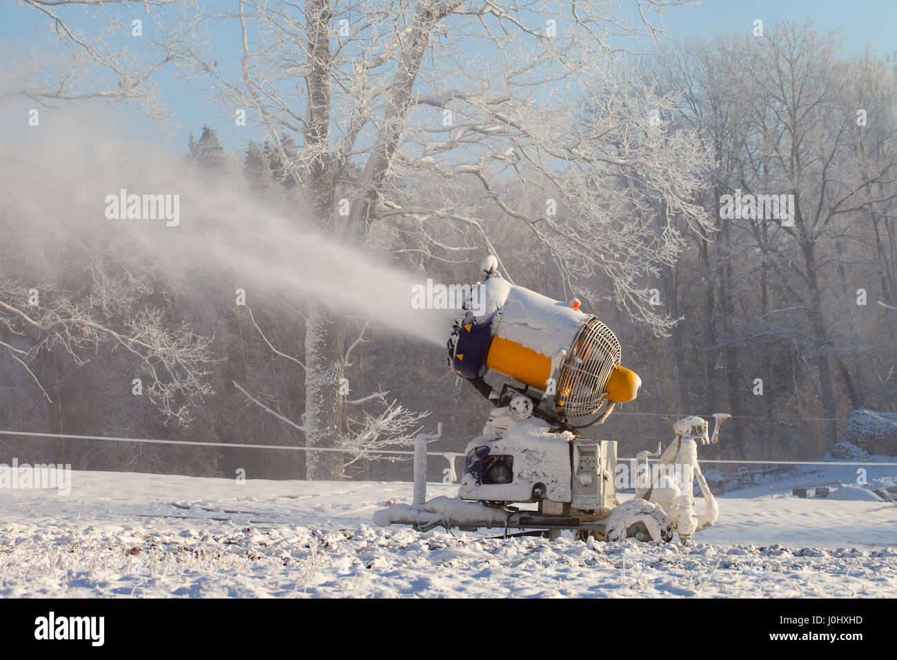 Snow gun in forest Stock Photo - Alamy
