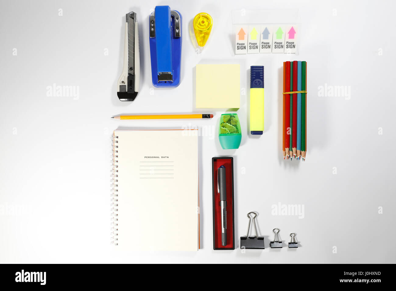 Notebook, color pencils, highlighter, memory note, pencil, binder clip ...