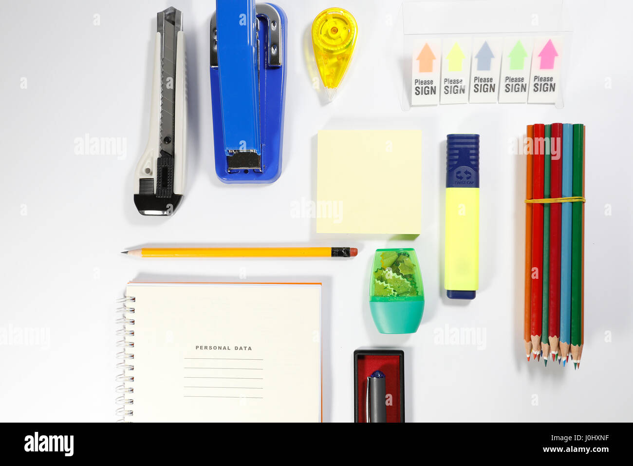 Notebook, color pencils, highlighter, memory note, pencil, binder clip ...