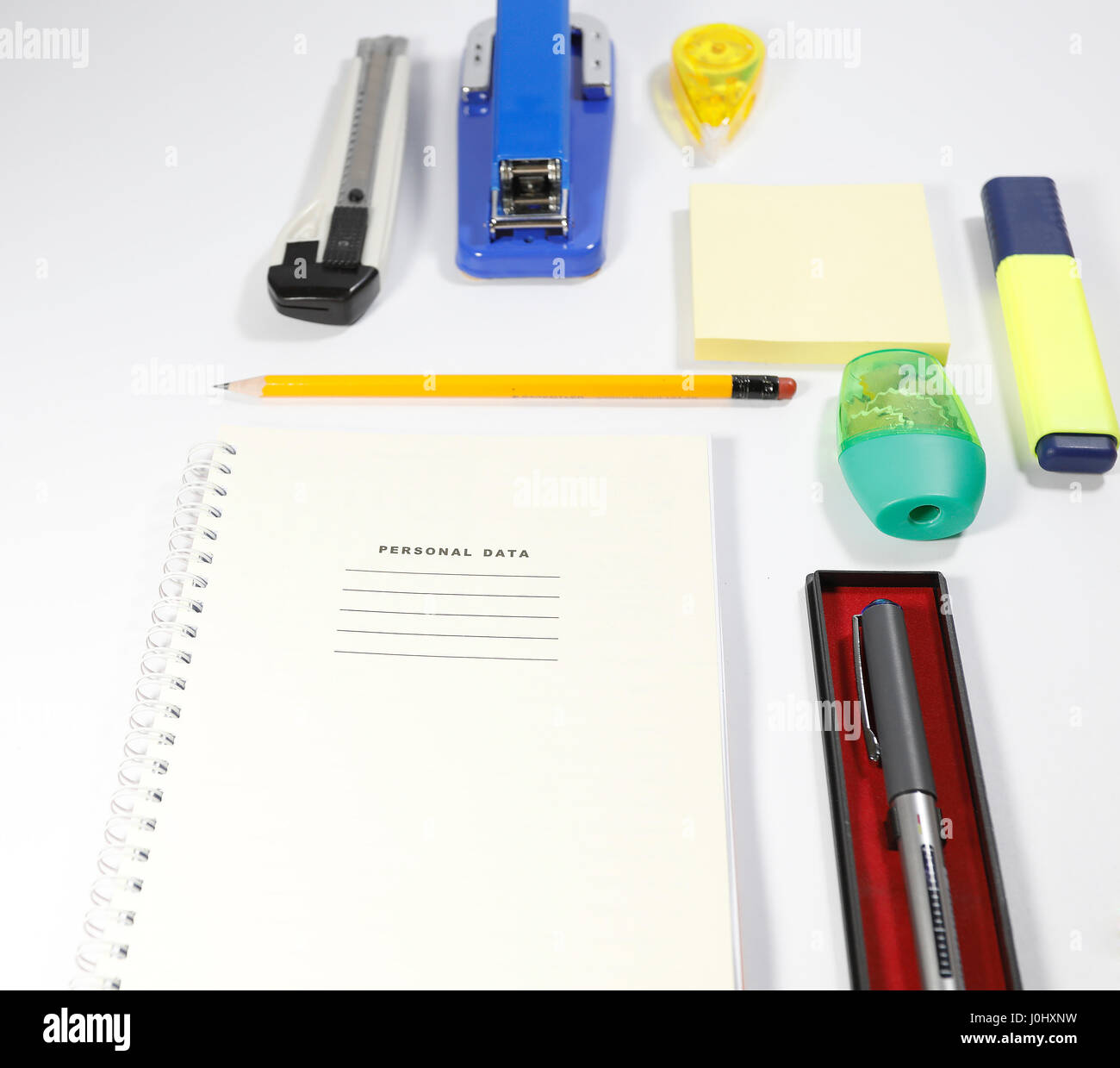 Notebook, color pencils, highlighter, memory note, pencil, binder clip ...