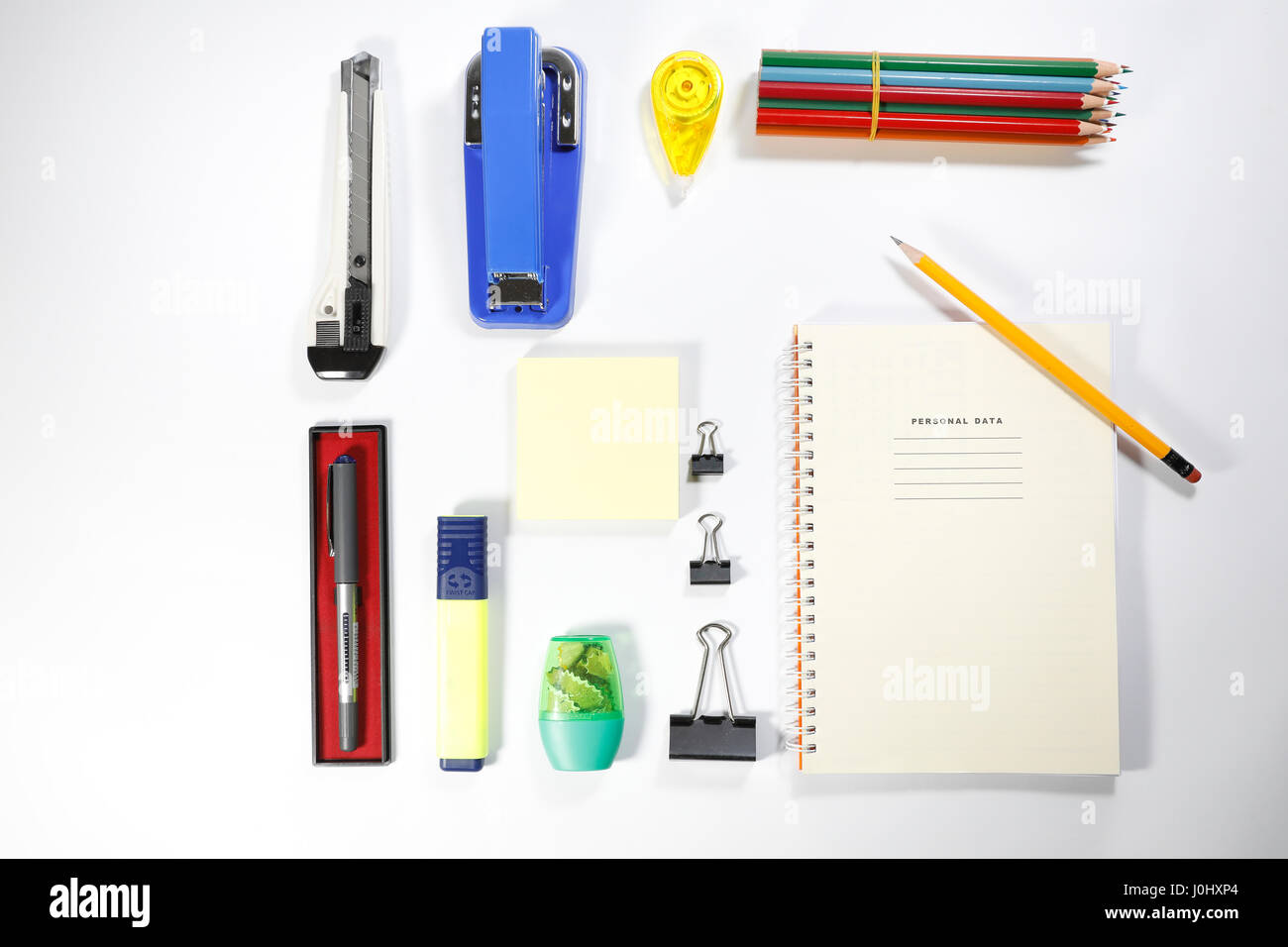 Notebook, color pencils, highlighter, memory note, pencil, binder clip ...