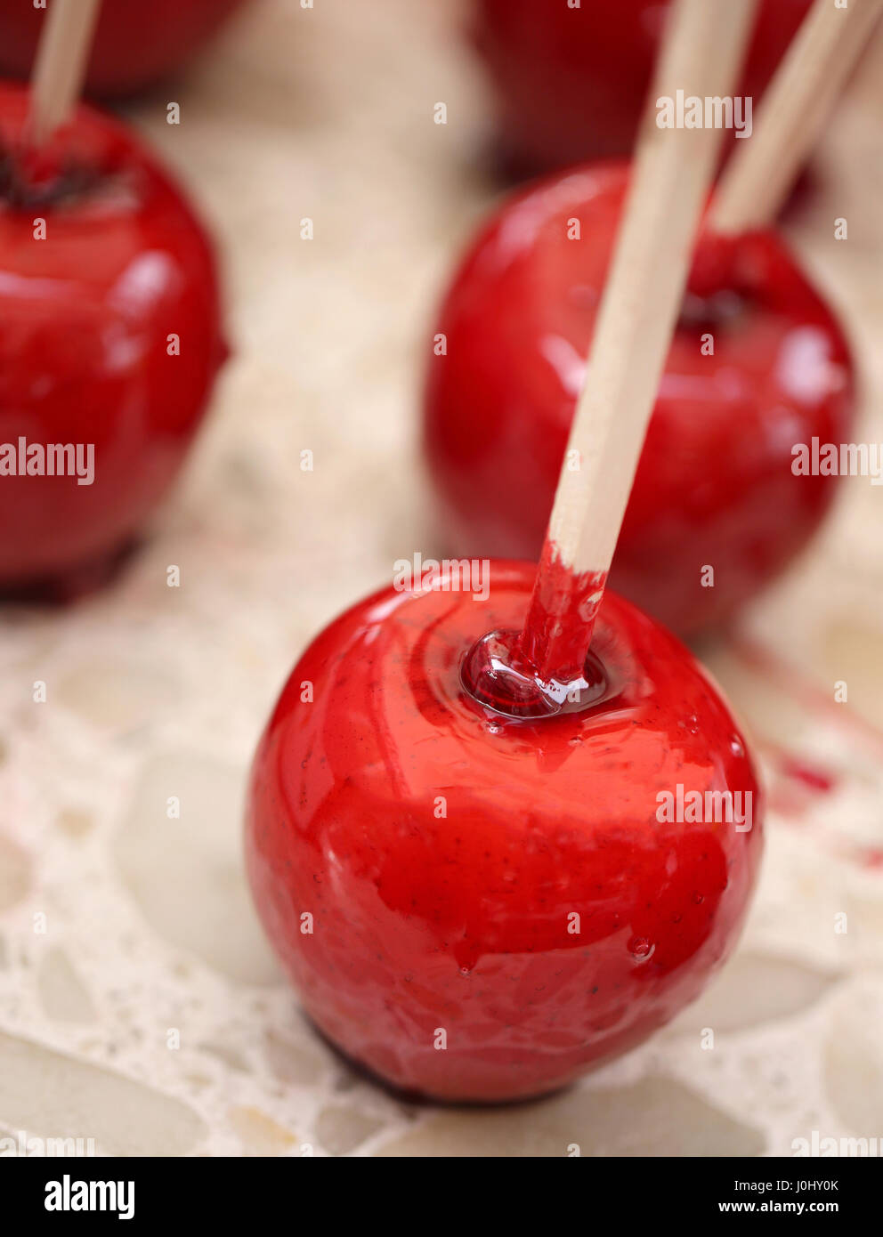 big red apple covered with caramelized sugar a typical dessert of ...