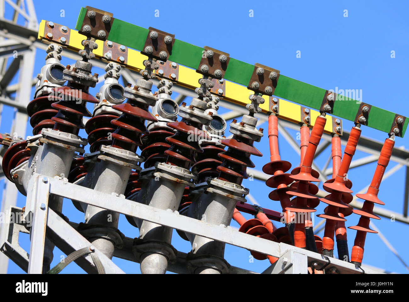 big electrical device in the substation at high voltage Stock Photo - Alamy