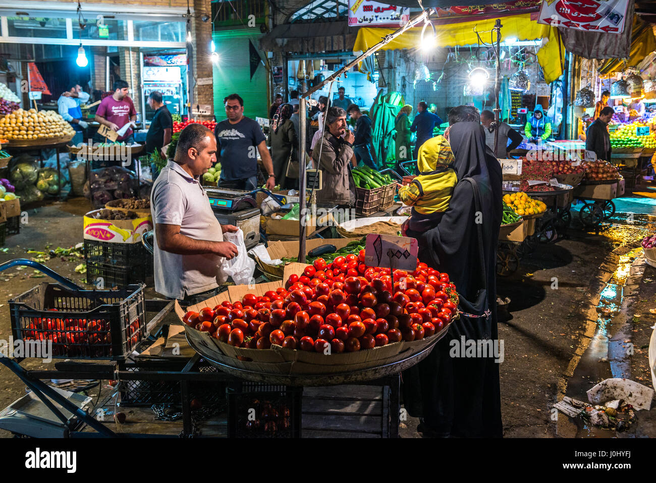Heap of tomatoes for sale on a small market place in Shiraz city ...