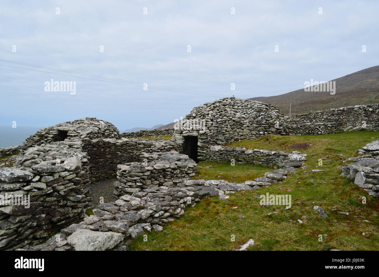 Fantastic collection of beehive huts in Dingle Ireland Stock Photo - Alamy