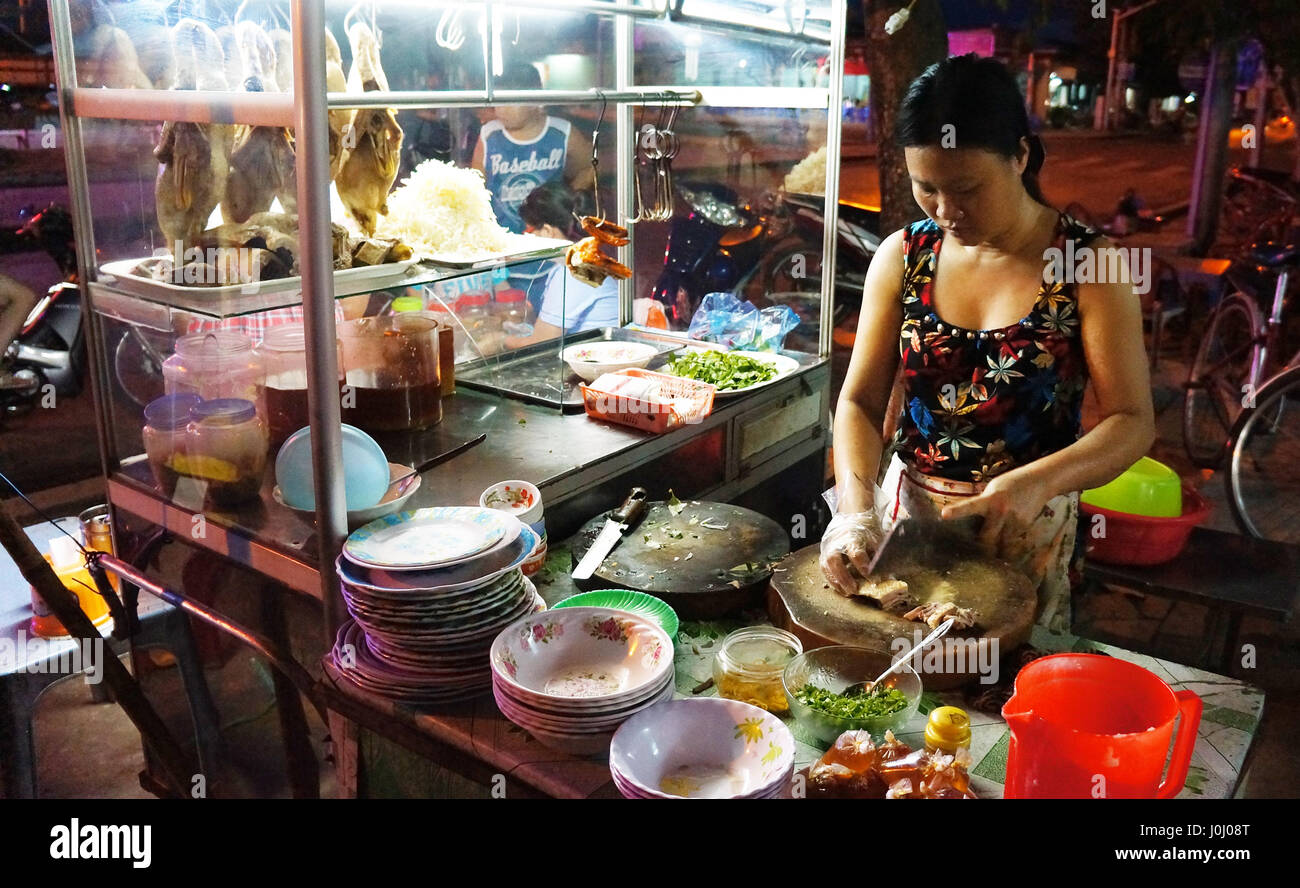 Ho Chi Minh city, Viet Nam, Vietnamese food store on pavement at Can ...