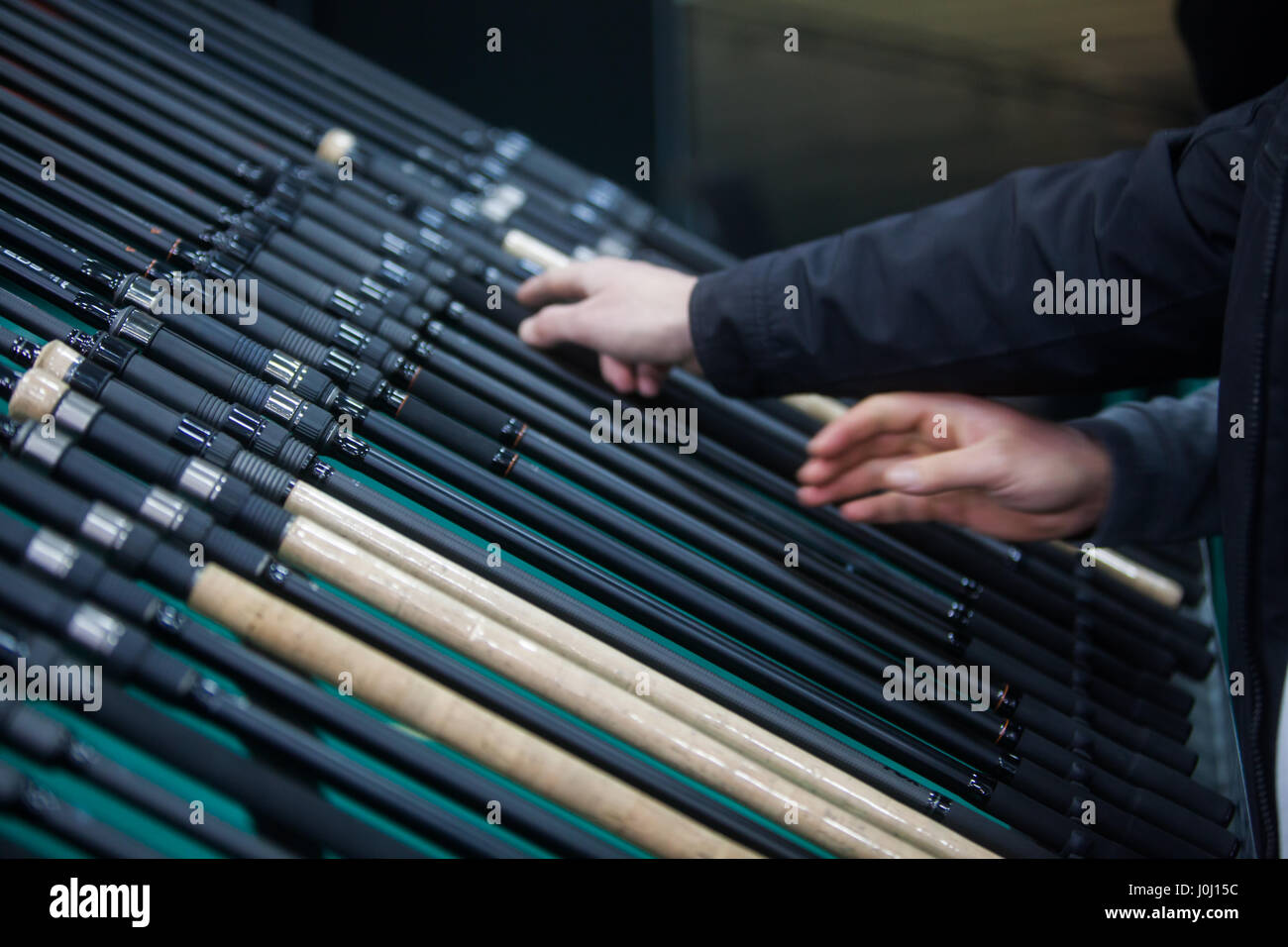 Close up shot of some fishing rods Stock Photo - Alamy