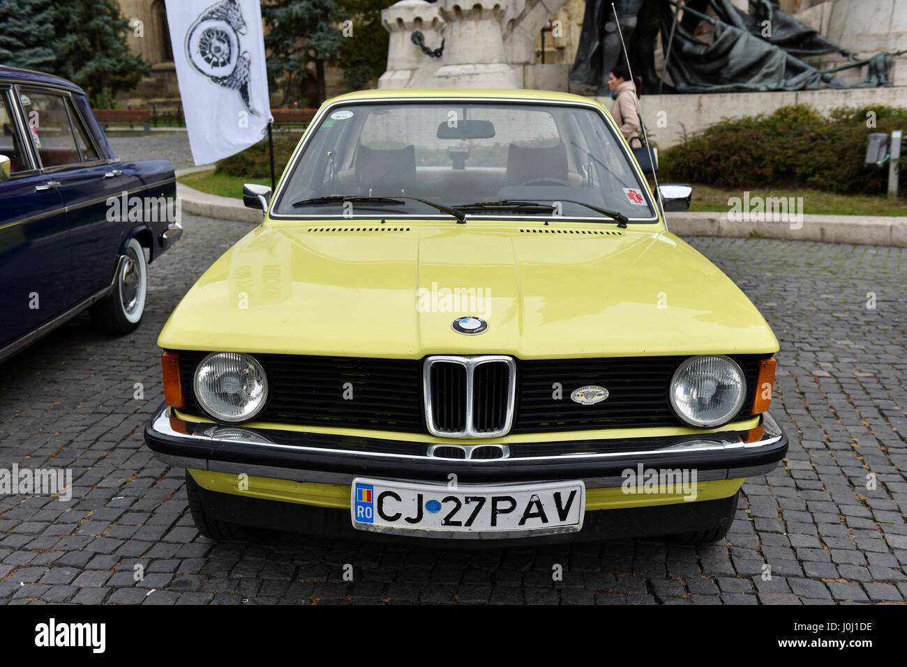 CLUJ-NAPOCA, ROMANIA - OCTOBER 15, 2016: Yellow BMW and other vintage ...