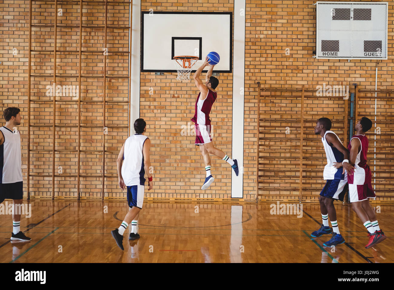 Male teammates practicing basketball hi-res stock photography and ...